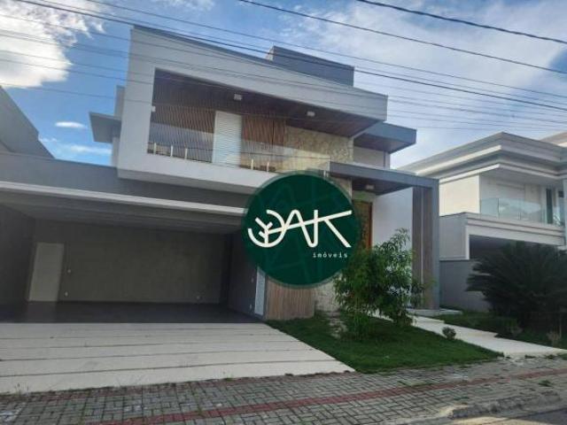 Casa com 4 dormitórios à venda, 450 m² por R$ 3.150.000 Condomínio Residencial Jaguary São José