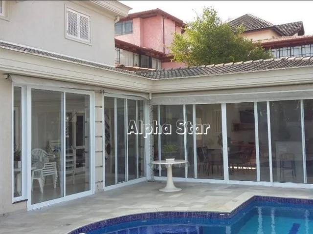 Casa com 4 dormitórios à venda, 465 m² por R$ 3.800.000,00 Alphaville 05 Santana de Parnaíba/SP