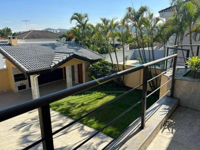Casa com 4 dormitórios à venda, 460 m² por R$ 4.290.000,00 Residencial Melville Santana de Parna