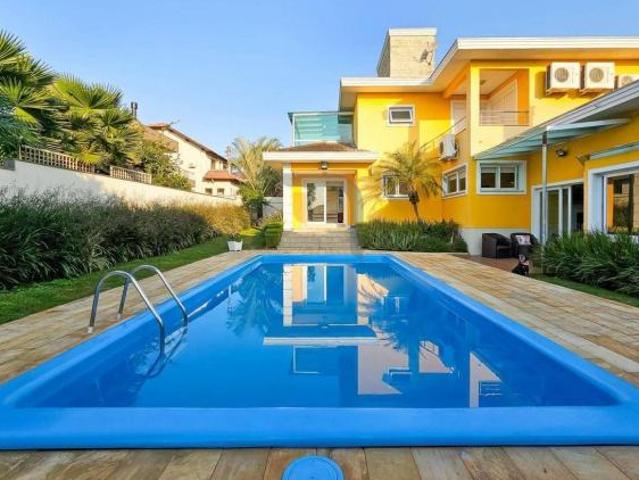 Casa com 4 dormitórios à venda, 473 m² Alphaville Gravataí/RS