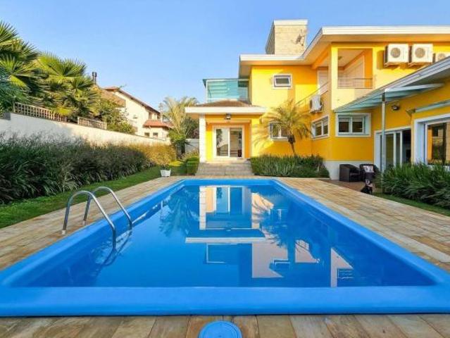 Casa com 4 dormitórios à venda, 473 m² Alphaville Gravataí/RS