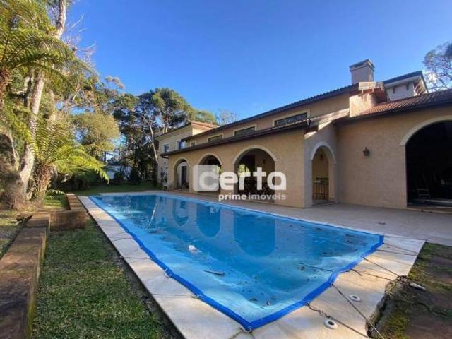 Casa com 4 dormitórios à venda, 498 m² Condomínio Centro Gramado/RS