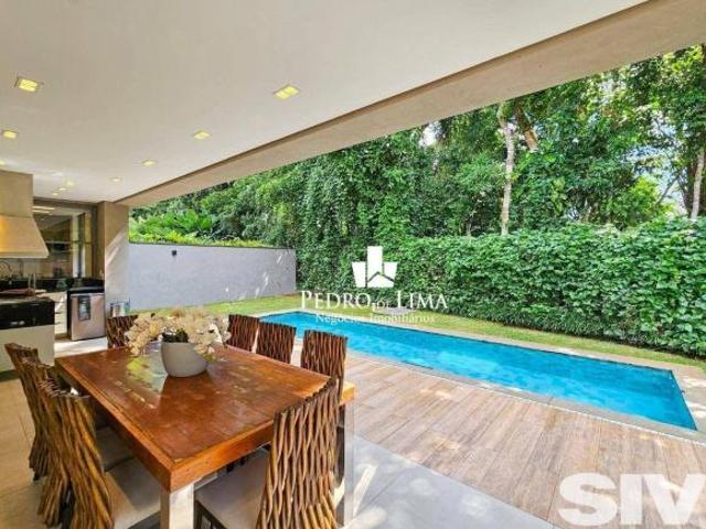 Casa com 4 dormitórios à venda, 493 m² por R$ 9.900.000 Riviera Módulo 12 Bertioga/SP
