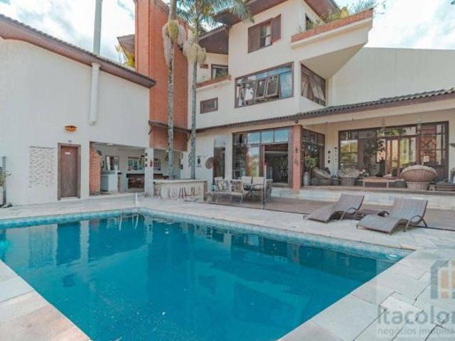 Casa com 4 dormitórios à venda, 500 m² por R$ 3.300.000,00 Residencial Dez Alphaville Santana