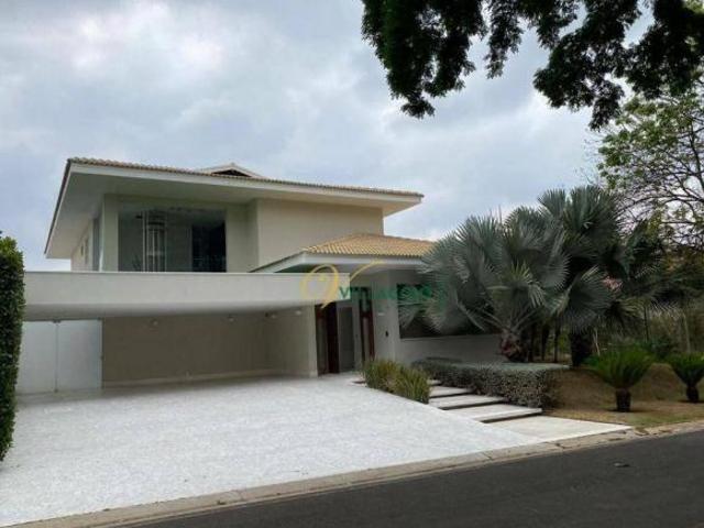 Casa com 4 dormitórios à venda, 502 m² por R$ 5.500.000,00 Condomínio Green Palm São José do Rio