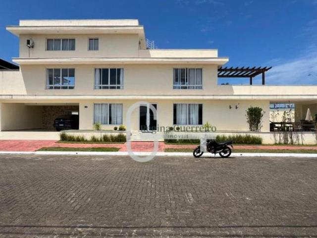 Casa com 4 dormitórios à venda, 518 m² por R$ 3.000.000,00 Condomínio Flora Rica Peruíbe/SP