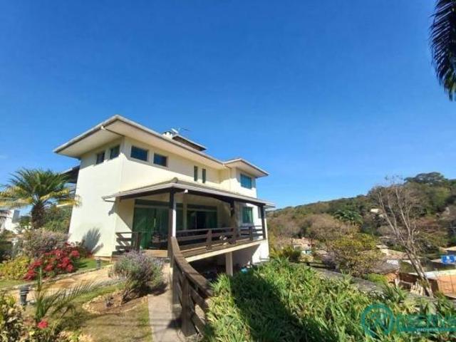 Casa com 4 dormitórios à venda, 567 m² por R$ 2.950.000,00 Condomínio Condados da Lagoa Lagoa Sa