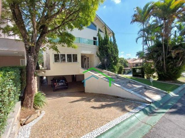 Casa com 4 dormitórios à venda, 639 m² por R$ 2.800.000,00 Residencial Quatro Alphaville Santa