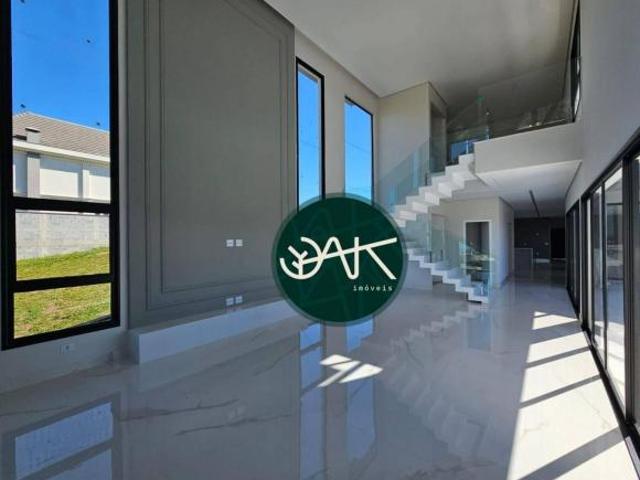 Casa com 4 dormitórios à venda, 650 m² por R$ 6.200.000,00 Condomínio Reserva do Paratehy São Jo