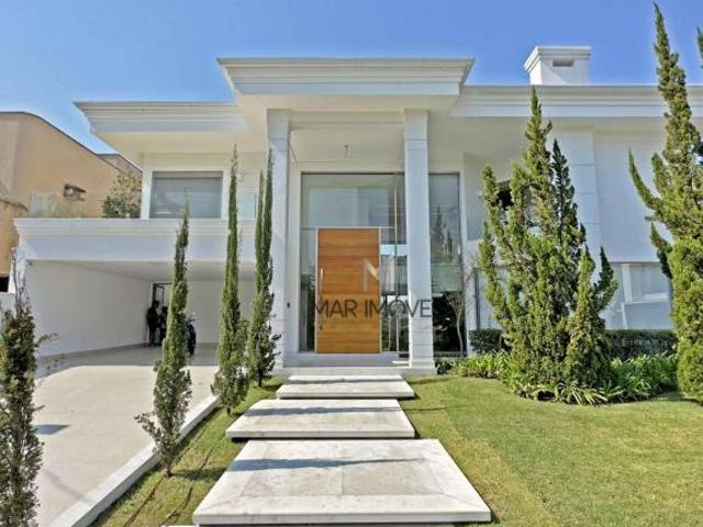 Casa com 4 dormitórios à venda, 665 m² por R$ 8.800.000,00 Acapulco Guarujá/SP
