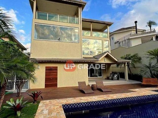 Casa com 4 dormitórios à venda, 969 m² por R$ 7.000.000,00 Residencial Melville Santana de Parna