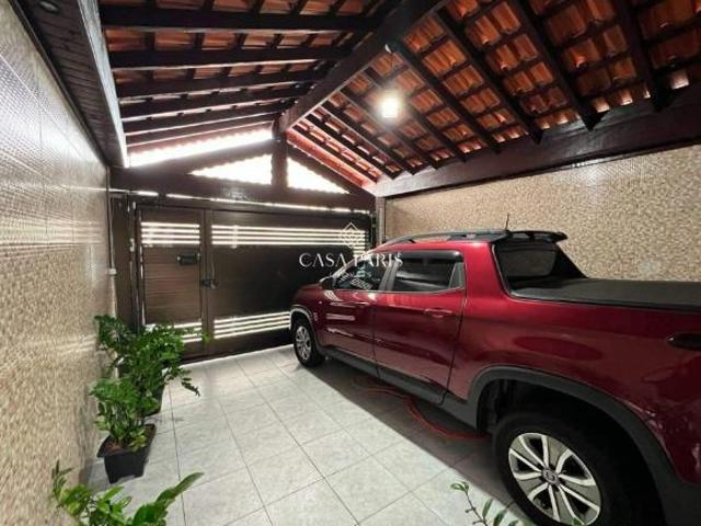 Casa com 4 dormitórios à venda na Tupi, em Praia Grande/SP