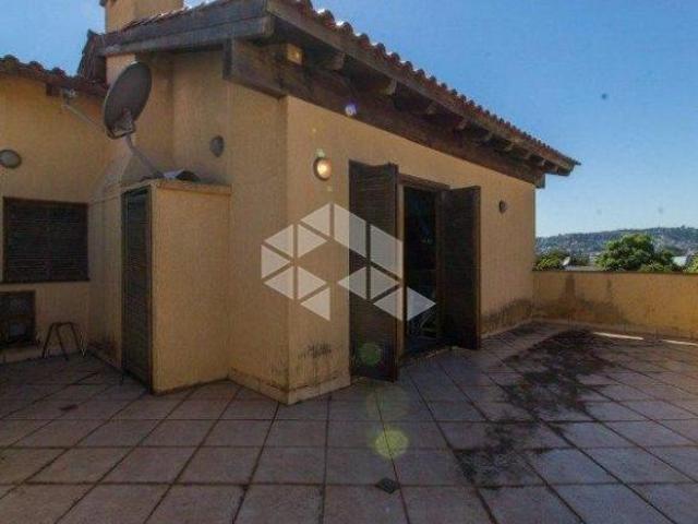 Casa com 4 dormitórios e 2 vagas, bairro Partenon em Porto Alegre/RS