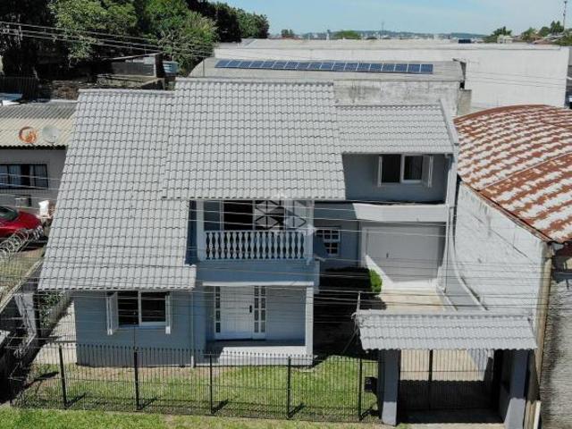 Casa com 4 dormitórios em Novo Hamburgo.