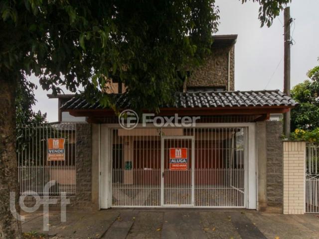 Casa com 4 dormitórios em Canoas