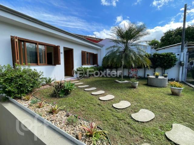Casa com 4 dormitórios em Esteio
