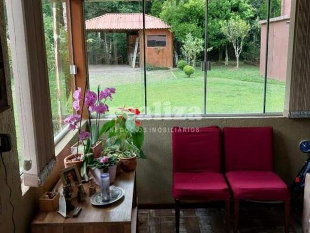 CASA COM 4 DORMITÓRIOS EM GRAMADO