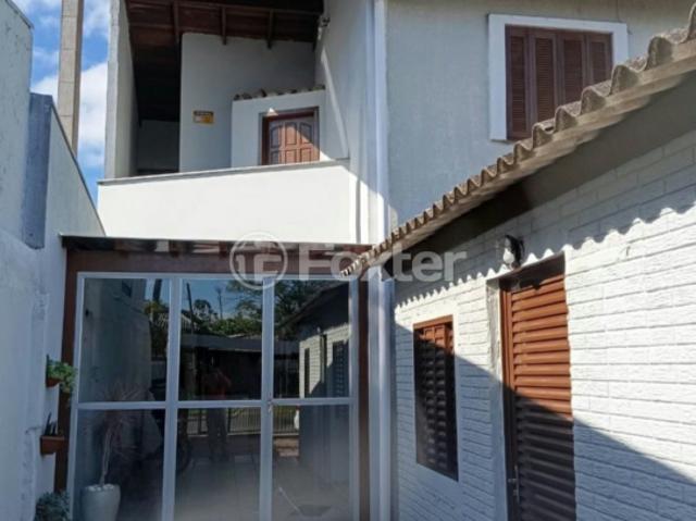 Casa com 4 dormitórios em Gravataí