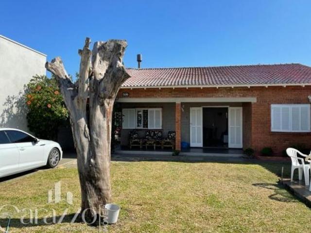 Casa com 4 dormitórios em Tramandaí