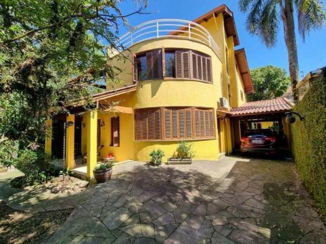 Casa com 4 Dormitórios / Piscina / Terraço / Bairro Ipanema