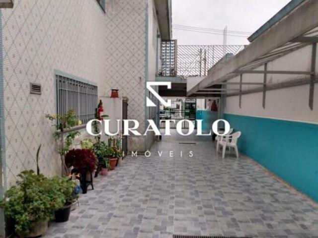 Casa com 4 dormitórios, quintal, 4 vagas Parque Tomás Saraiva