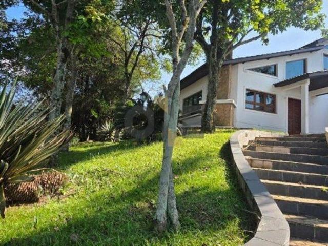 Casa com 4 dormitórios, sendo 2 suítes para venda ou locação Granja Viana Cotia SP