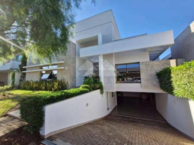 Casa com 4 dormitórios sendo 3 suítes à venda, 319 m² por R$ 2.100.000 Condomínio Arco de Paris