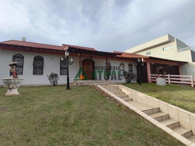 CASA COM 4 DORMITÓRIOS SENDO 3 SUÍTES A VENDA NA ZONA SUL