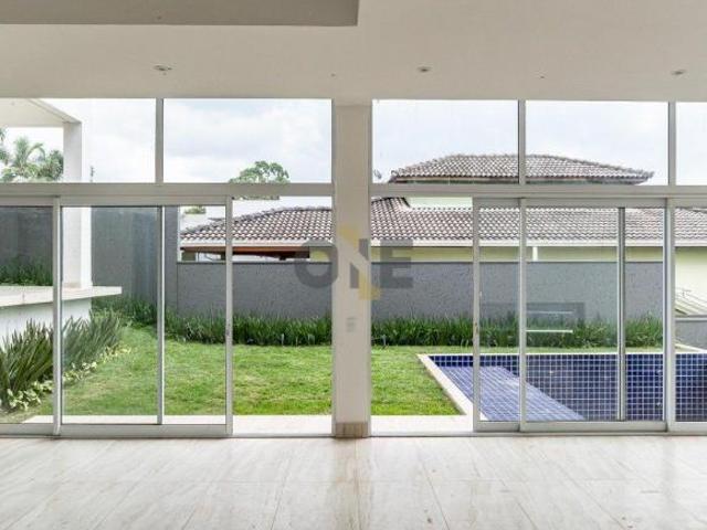 Casa com 4 dormitórios, sendo 4 suítes para venda ou locação Granja Viana Cotia SP