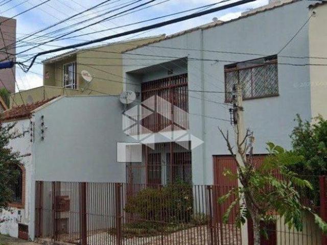 Casa com 4 dormitórios/quartos e 2 vagas no bairro Santana