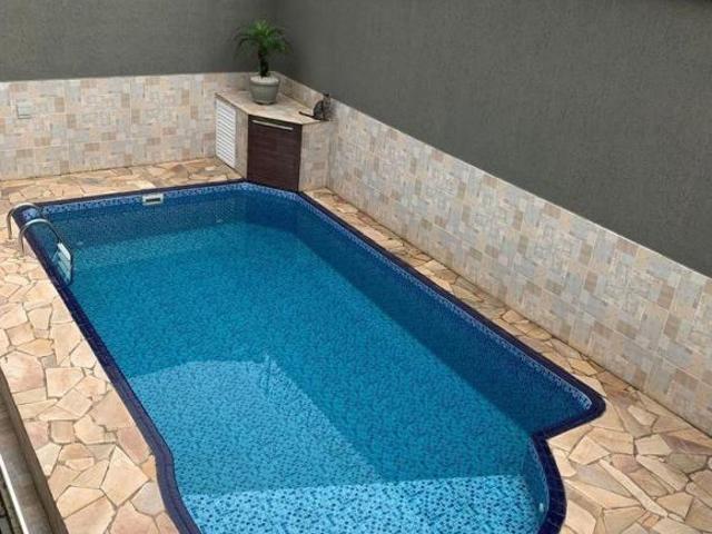 Casa com 4 dorms, Flórida, Praia Grande R$ 1.35 mi