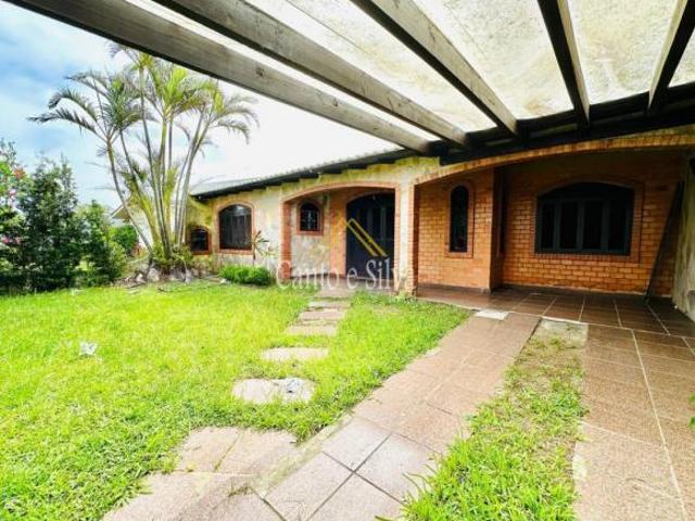 Casa com 4 dorms, sendo 3 suítes em Atlântida Sul