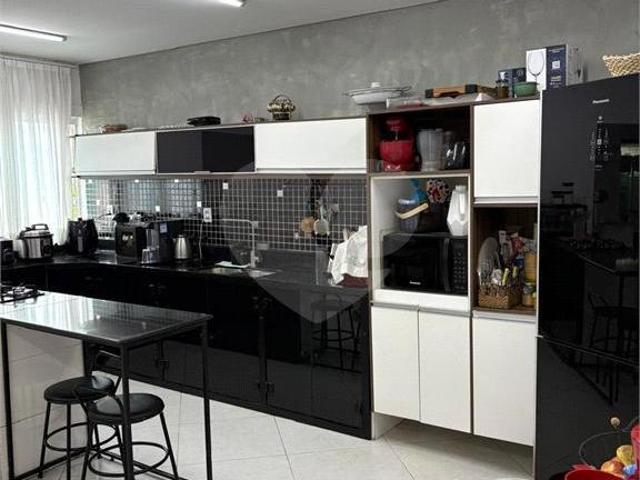 Casa com 4 quartos à venda em Vila Lavínia SP