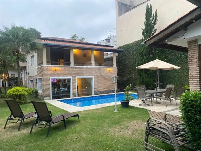 Casa à venda com 4 suítes em Granja Julieta, São Paulo SP