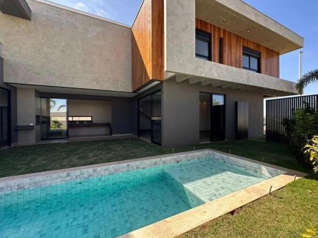 Casa com 4 quartos à venda no Condomínio Jardim Versailles Uberlândia/MG