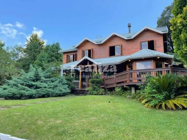 CASA COM 4 QUARTOS EM GRAMADO