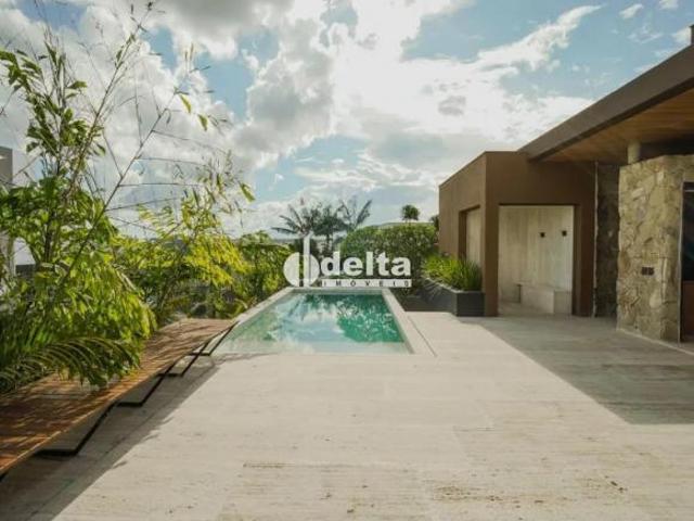 Casa com 4 quartos sendo suíte disponível para venda no bairro Morada da Colina em Uberlândia MG