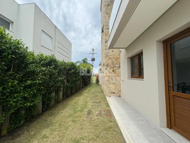 Casa com 4 suítes no Condomínio Ocean Side em Torres RS