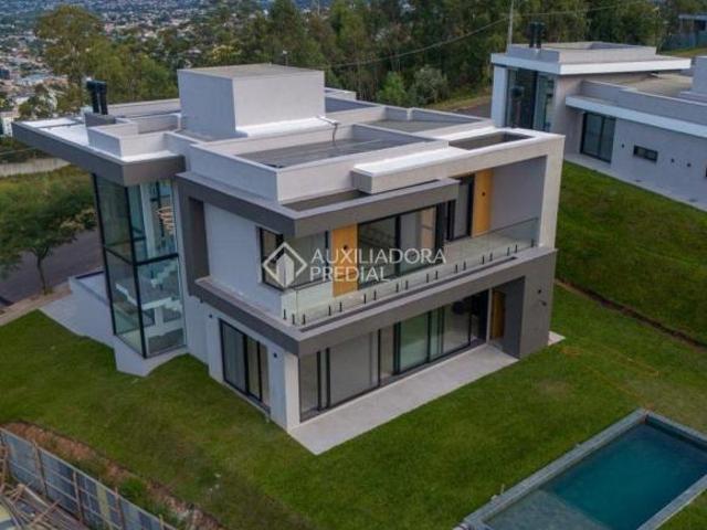 CASA COM 4 SUÍTES 423,57m²