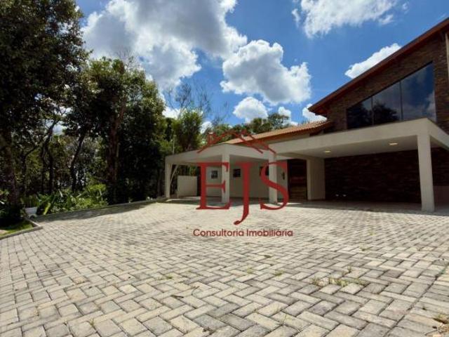 Casa com 4 suítes térrea somente 1 suíte máster no piso superior á venda, 378 m² em um dos condomíni