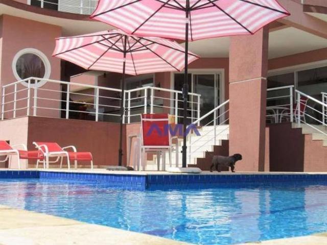 Casa com 4 suítes, piscina e área de lazer à venda na Granja Viana