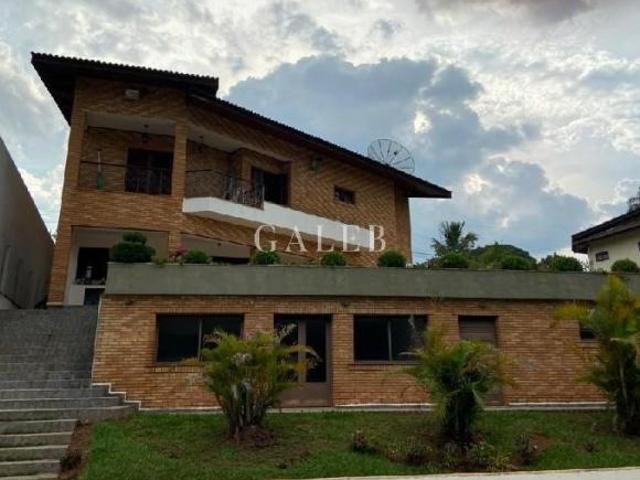 Casa com 4 suítes à venda em condomínio de alto padrão