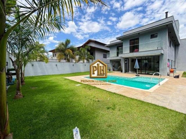 CASA COM 4 SUITES DENTRO DE CONDOMINIO FECHADO EM ATIBAIA