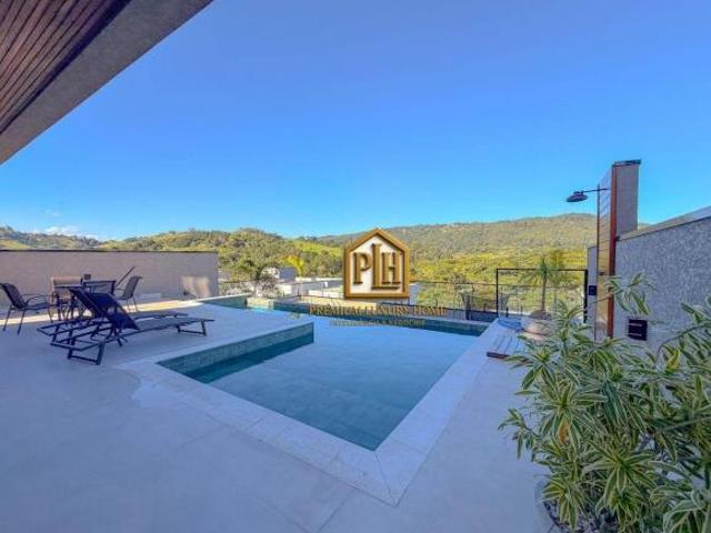 CASA COM 4 SUITES E UMA VISTA INCRIVEL EM CONDOMINIO FECHADO