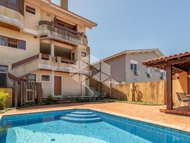 Casa com 4 suítes, no Bairro Vila Assunção, Porto Alegre