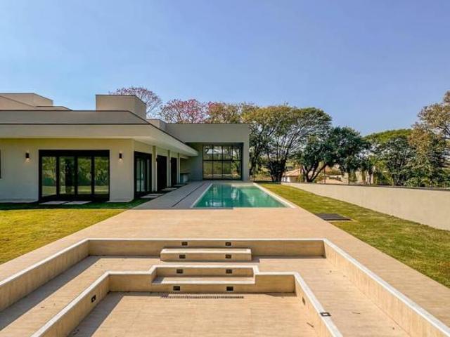 Casa com 4 suítes no condomínio FAZENDA SERRAZUL I