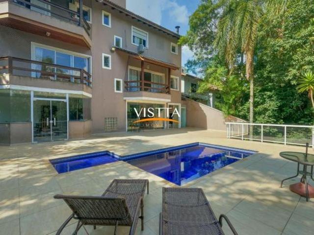 Casa com 4 suites, PIscina Aquecida e Espaço Gourmet