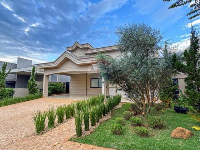 Casa com 547m², 4 suítes Condomínio Guaporé III