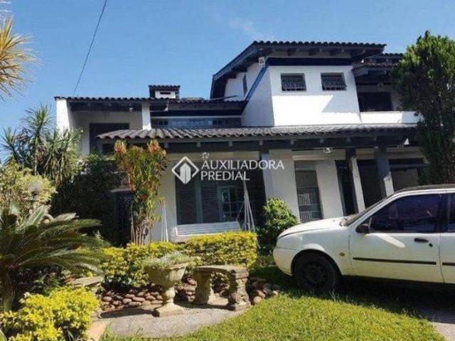 Casa com 5 dormitórios no bairro Tristeza