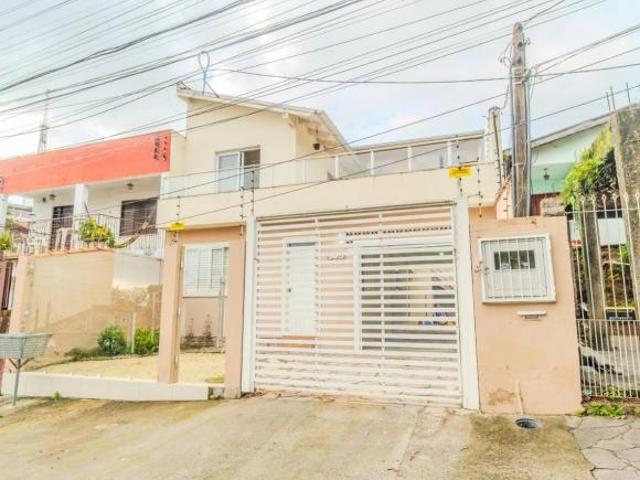 Casa com 5 dormitórios no bairro Santa Tereza